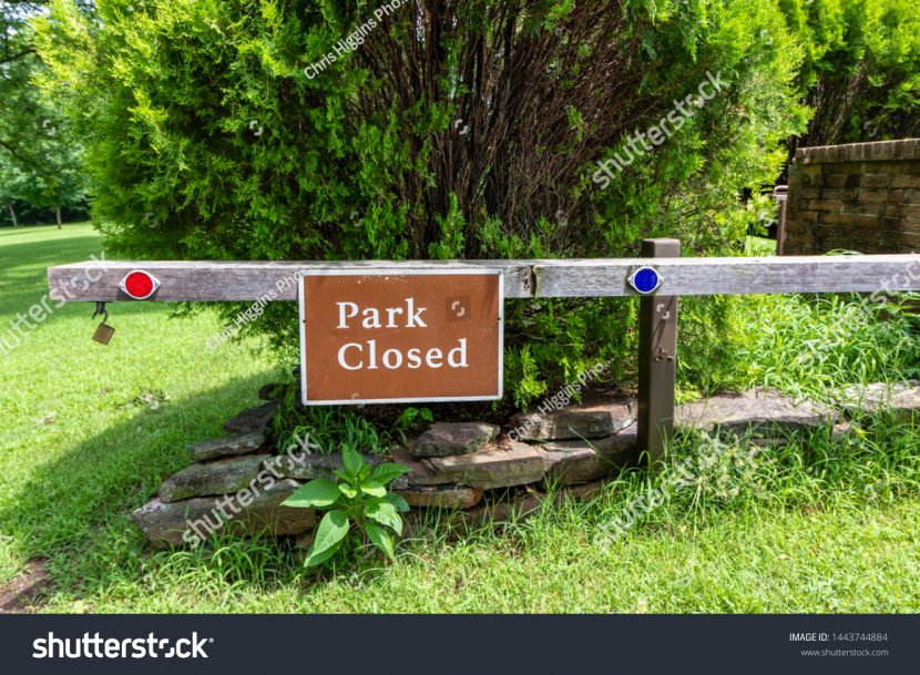 stock-photo-brown-park-closed-sign-on-weathered-wooden-post-with-red ...